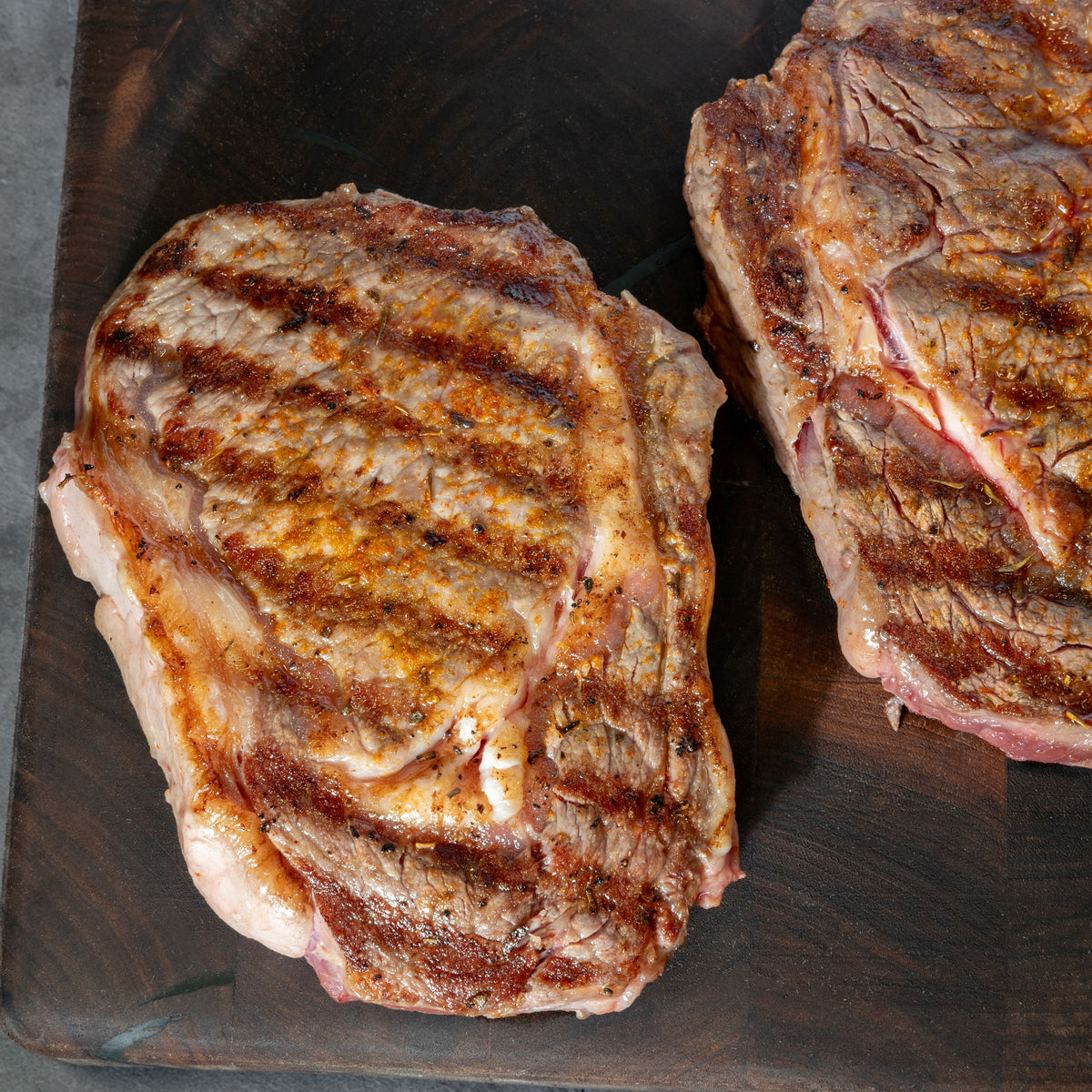 Bison Ribeye Steak with Garlic Herb Butter and Roasted Brussels Sprout ...